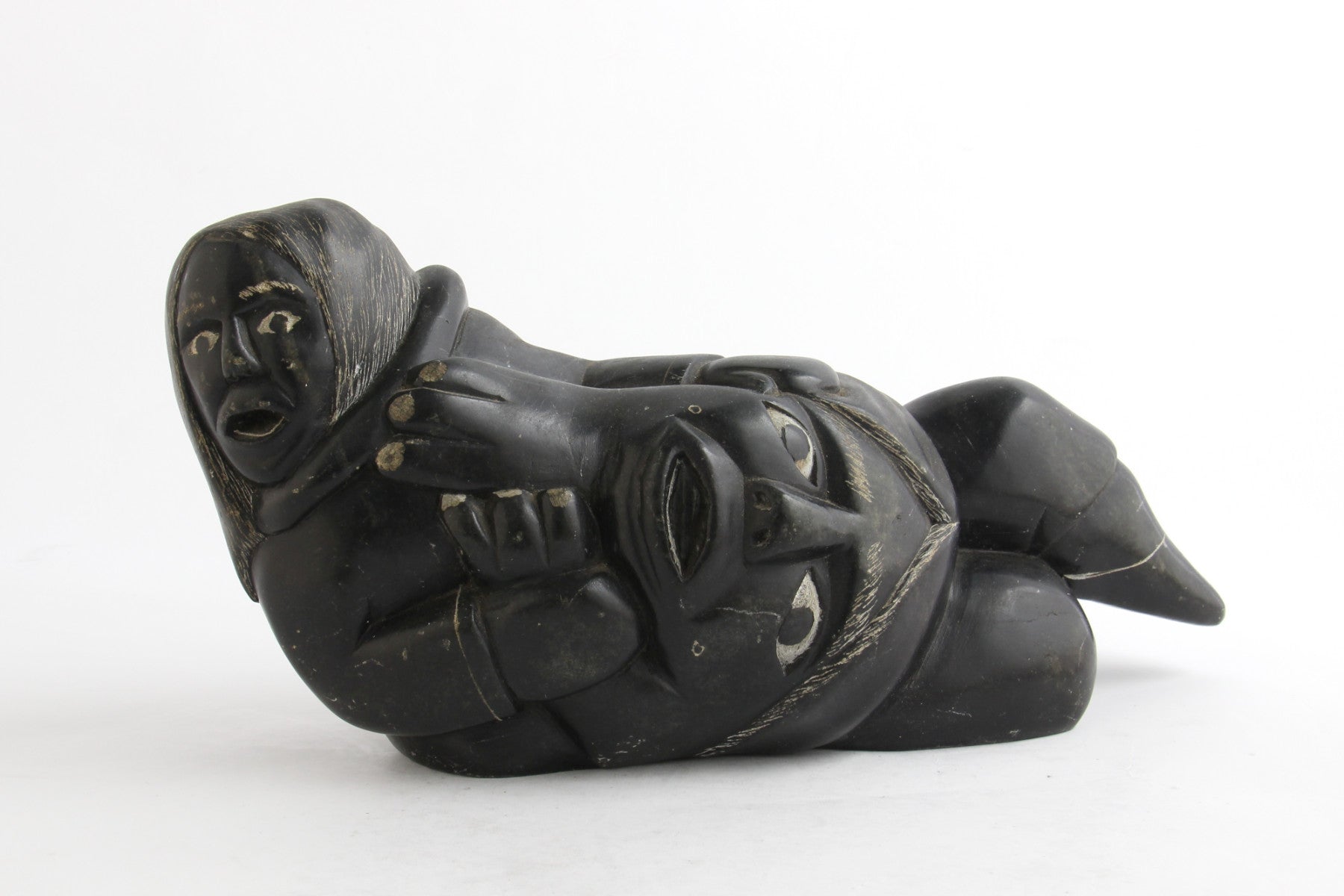 Man with Katyutayuuq by Aisa Amittu